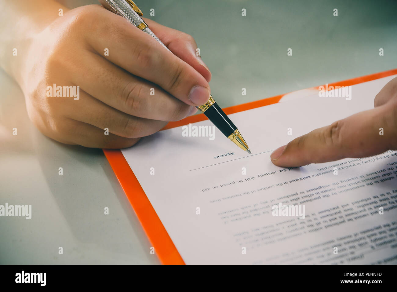 Close up of business man signing contract making a deal, business ...