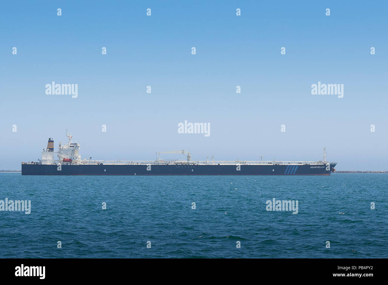 Supertanker, (Crude Oil Tanker), AQUAPUELCHE, Anchored In The Port Of ...