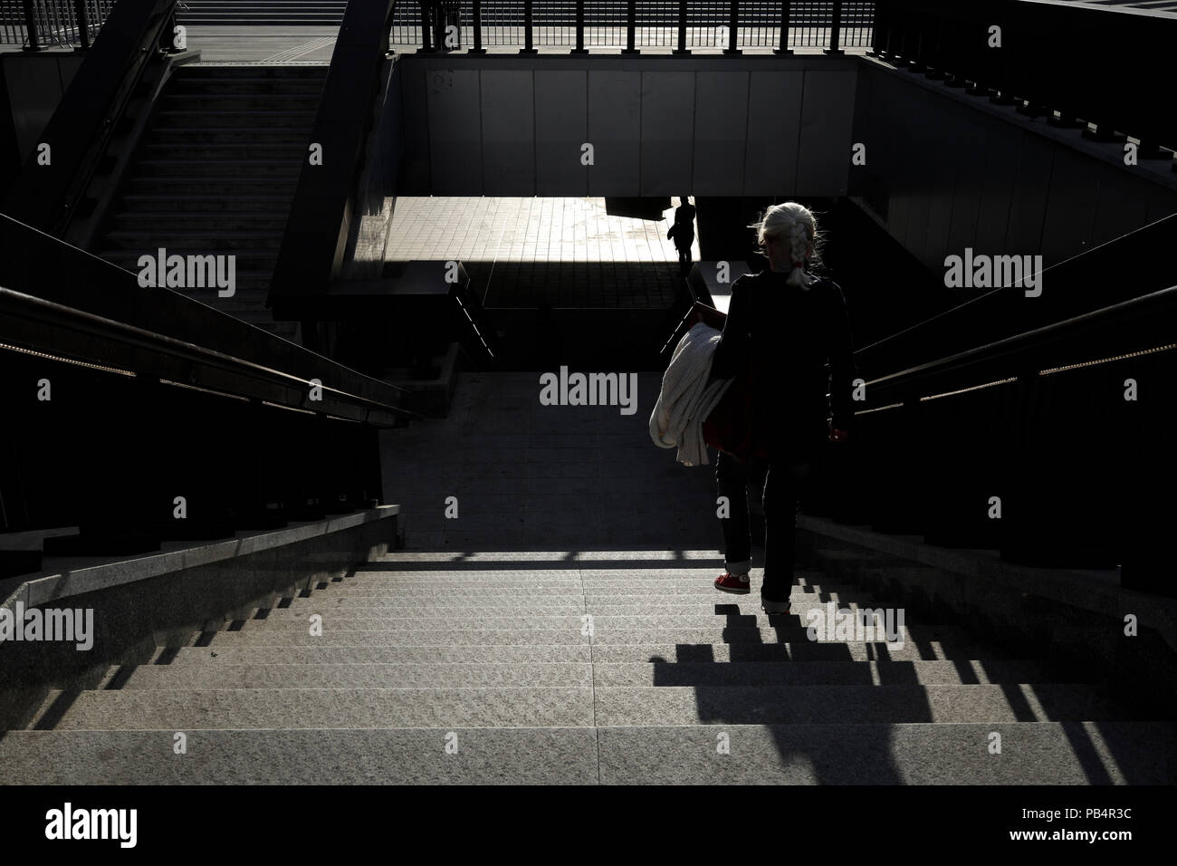 Shadow people walking down stairs hi-res stock photography and images ...