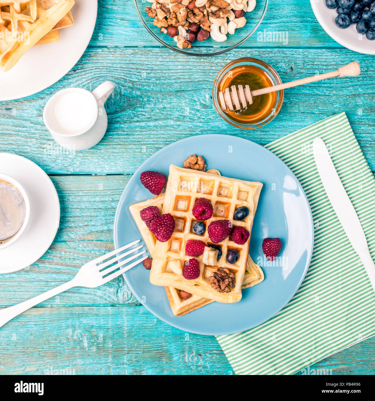 Homemade waffles with raspberries and blueberry Stock Photo - Alamy