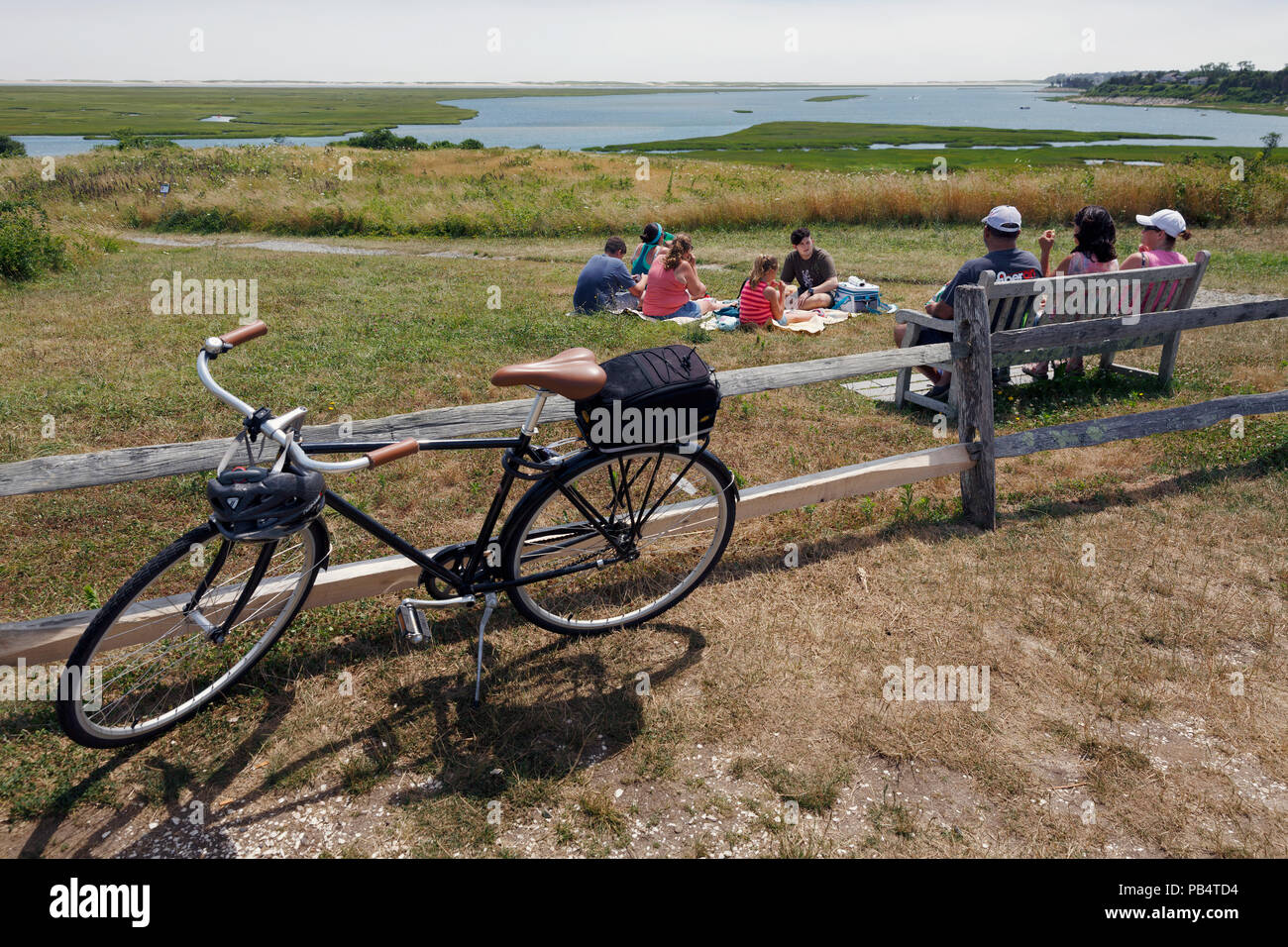 Family picnic on the edge of marsh, Eastham, Cape Cod, Massachusetts ...