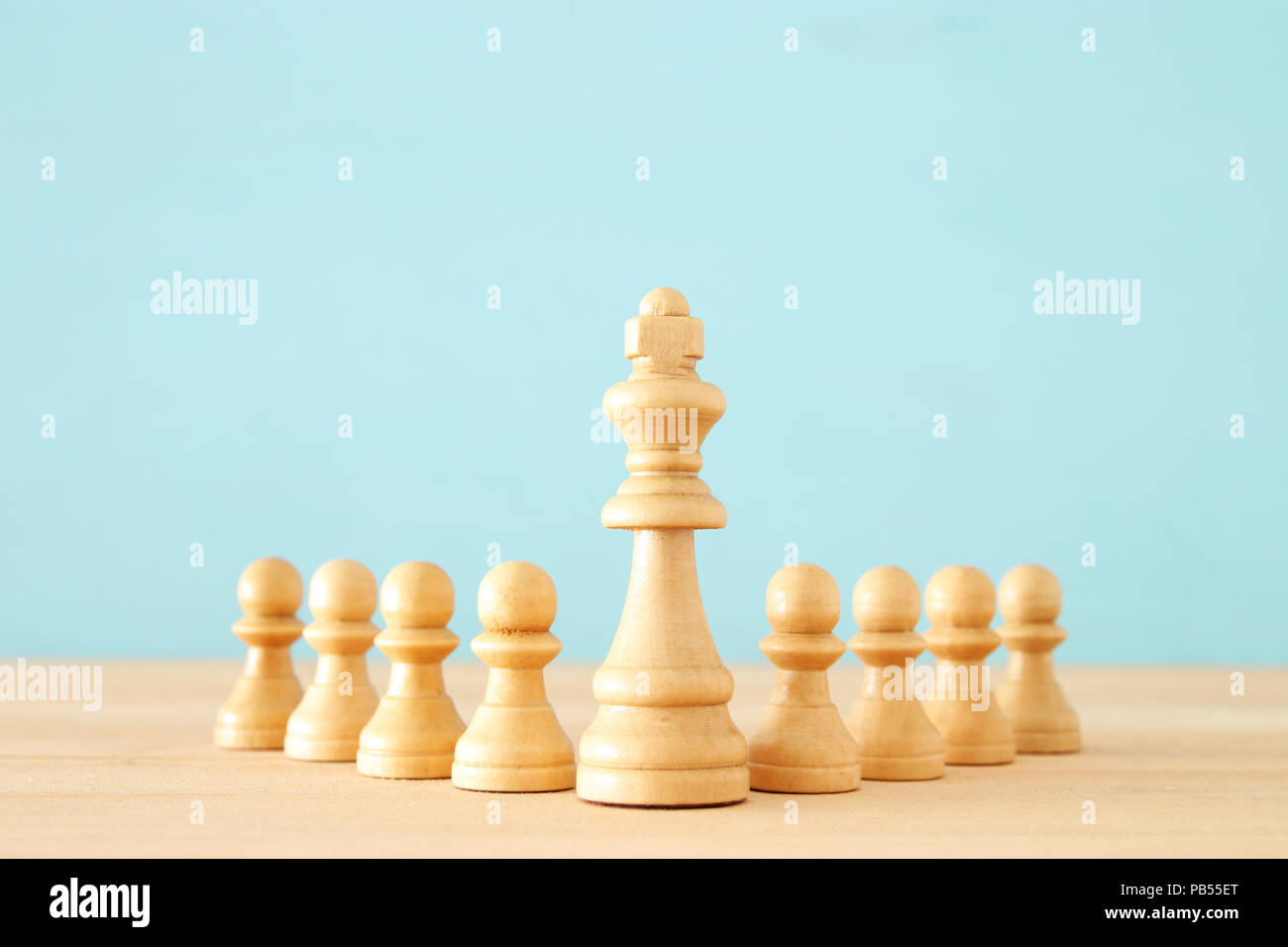 image of wooden chess ponds over table ,building a strong team, human ...
