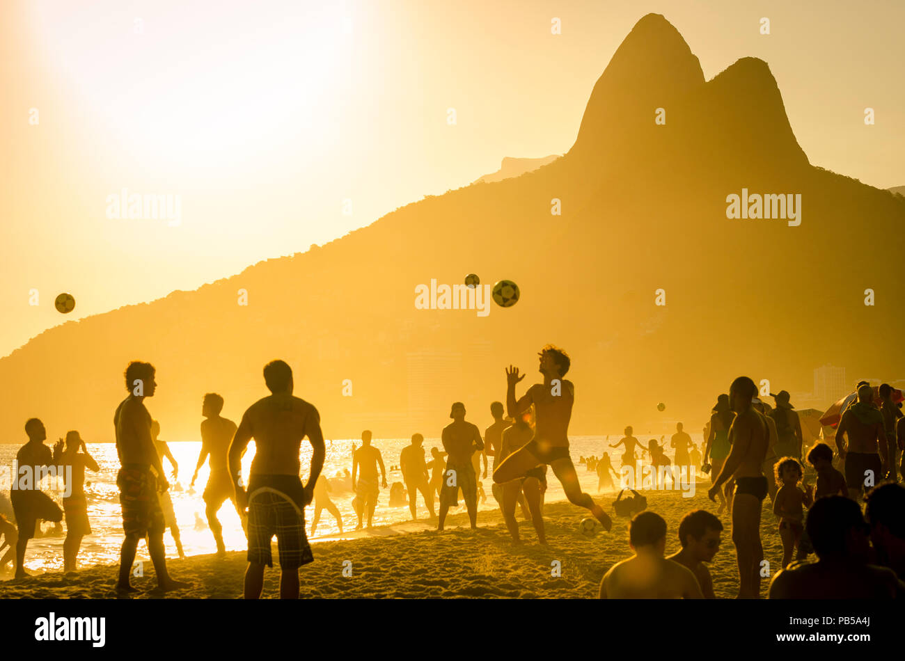 RIO DE JANEIRO - CIRCA JANUARY, 2014: Beachgoers on Ipanema Beach sit ...