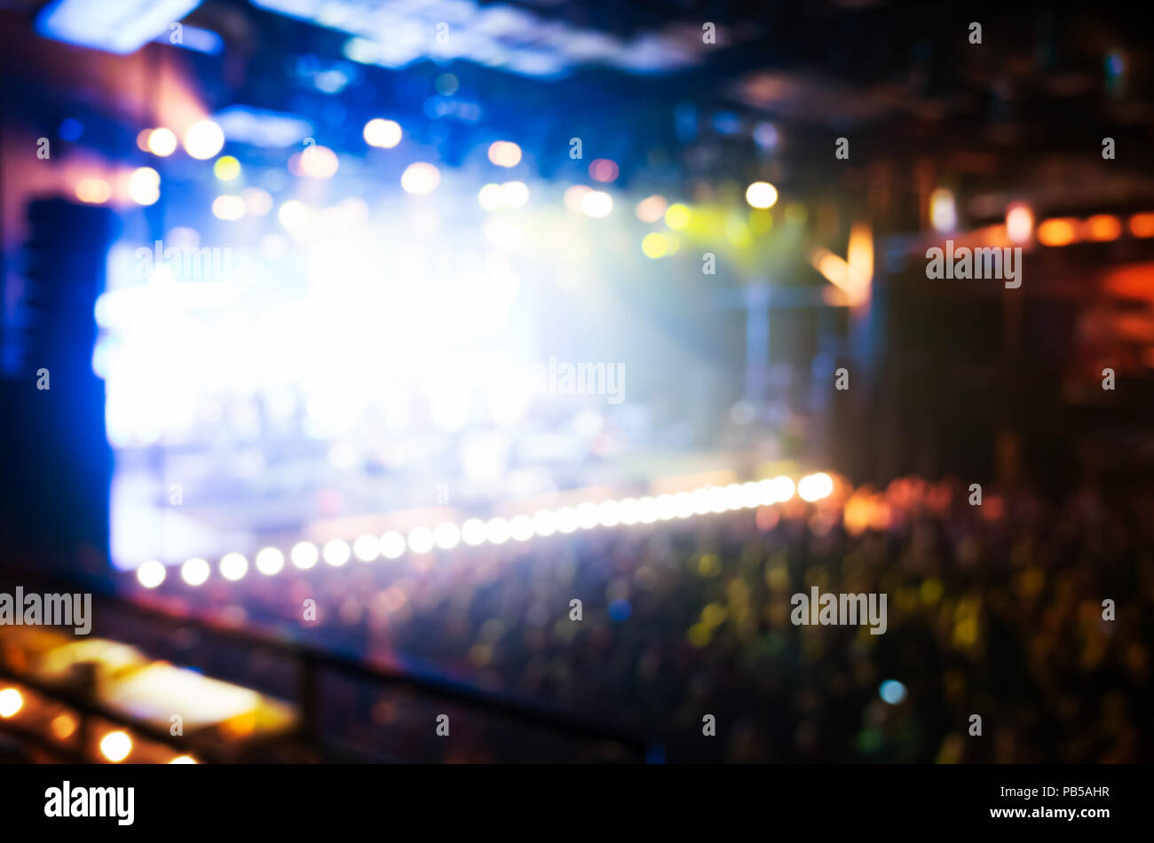 Blurred photo background, life music concert stage with colorful ...