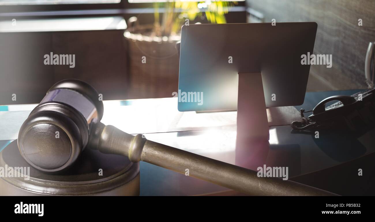 Gavel and computer screen on desk Stock Photo - Alamy