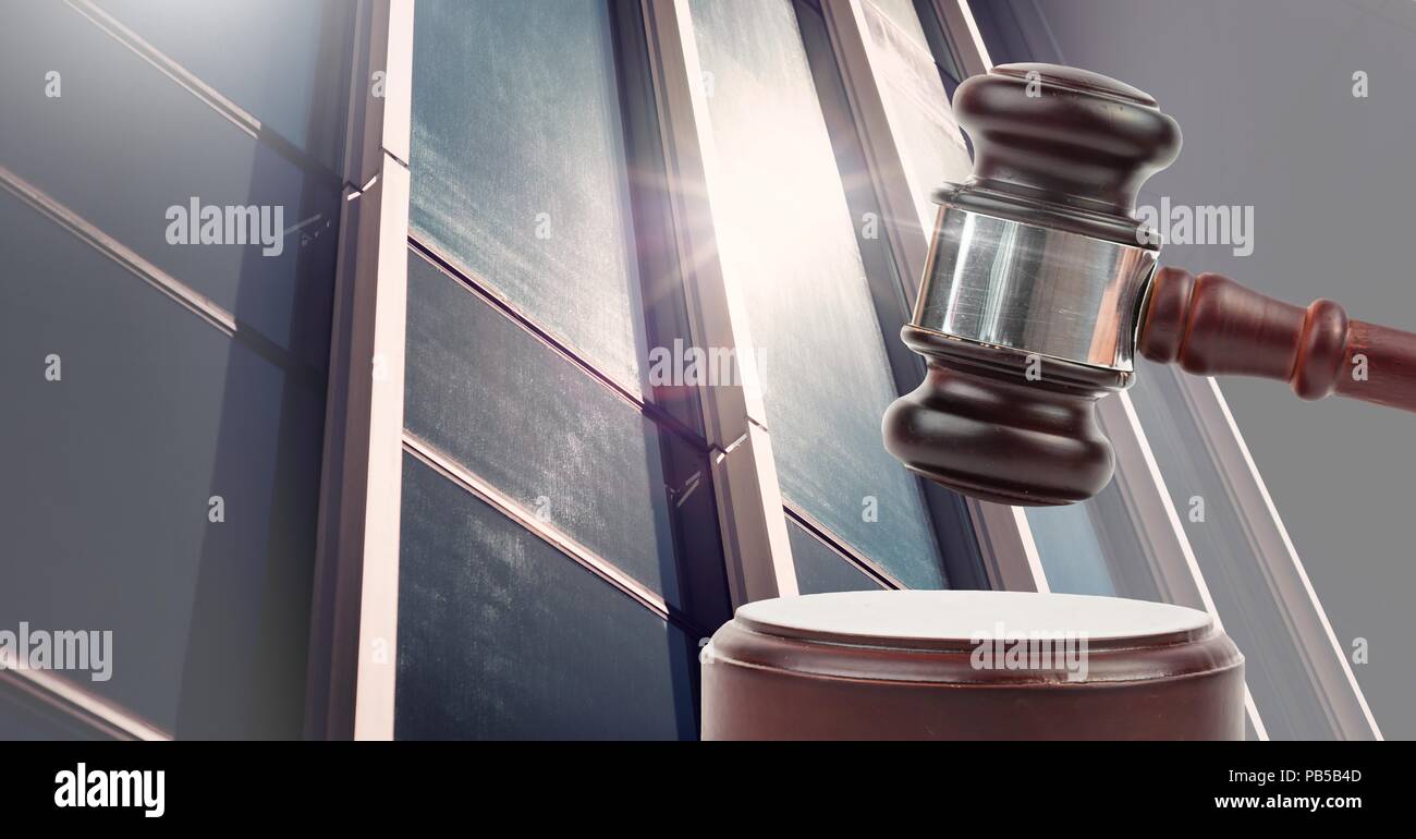 Gavel and skyscraper building auction Stock Photo - Alamy