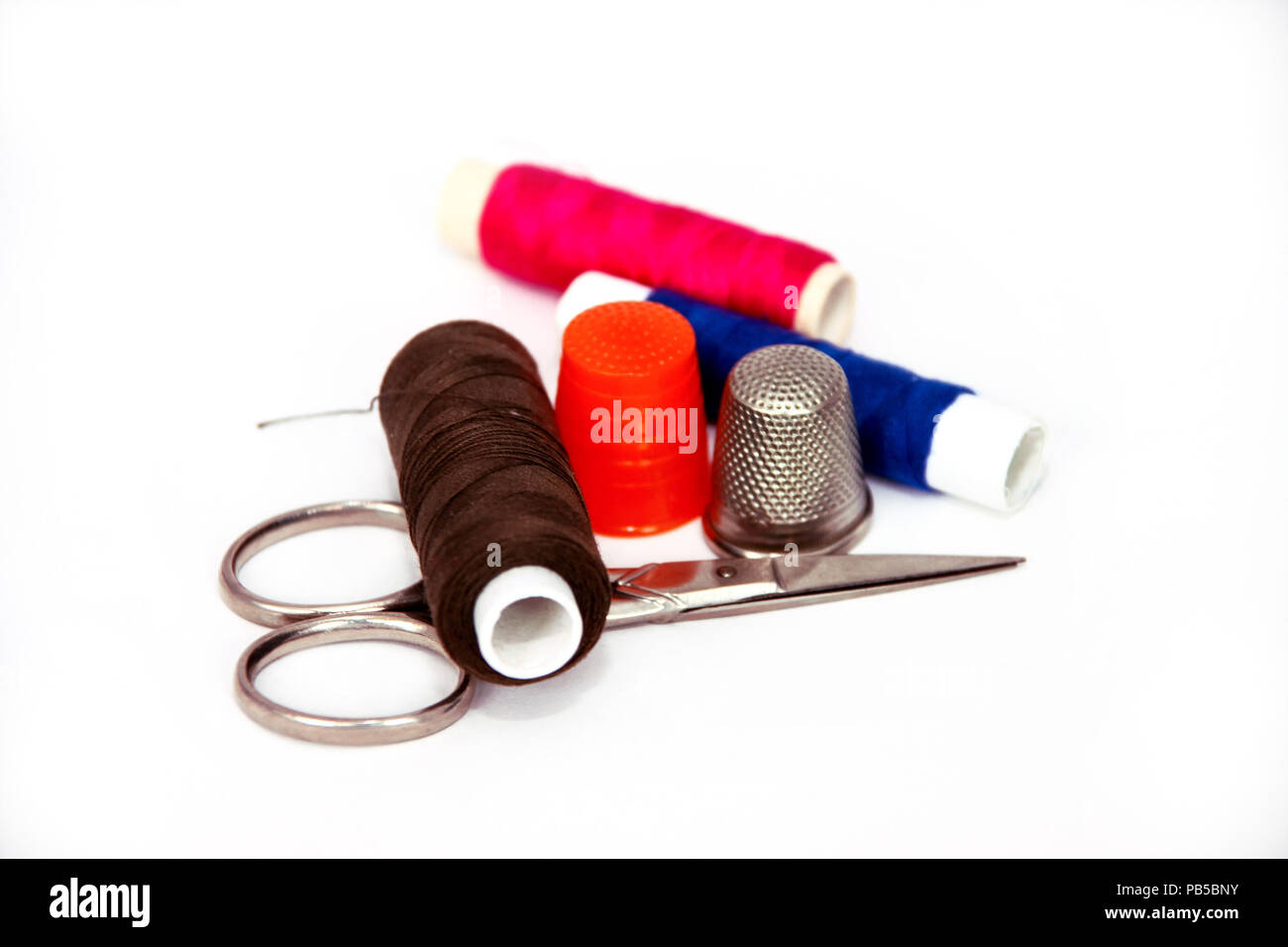 Sewing kit tools with white background Stock Photo - Alamy