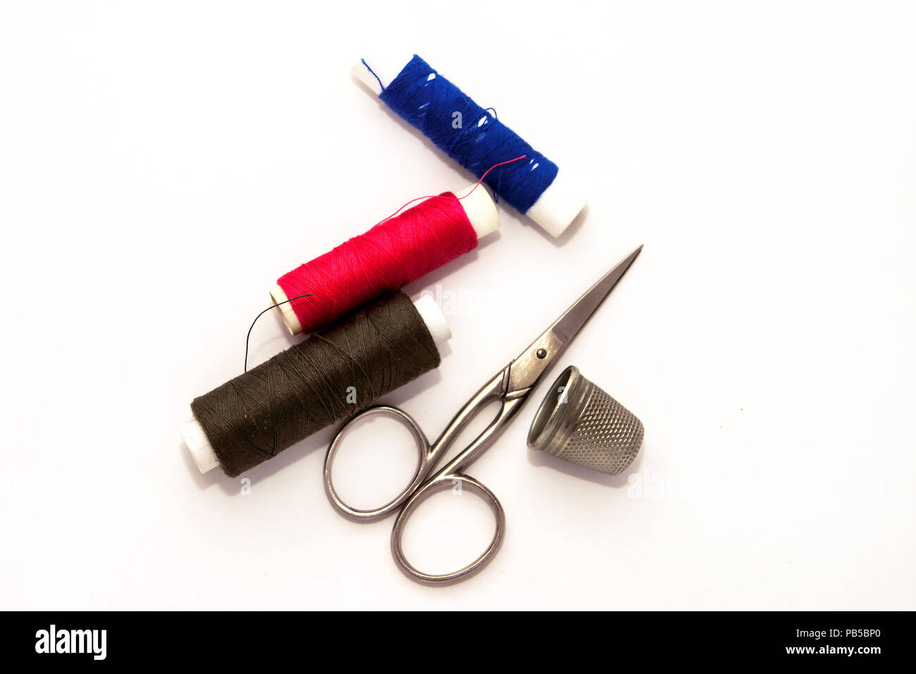 Sewing kit tools with white background Stock Photo - Alamy