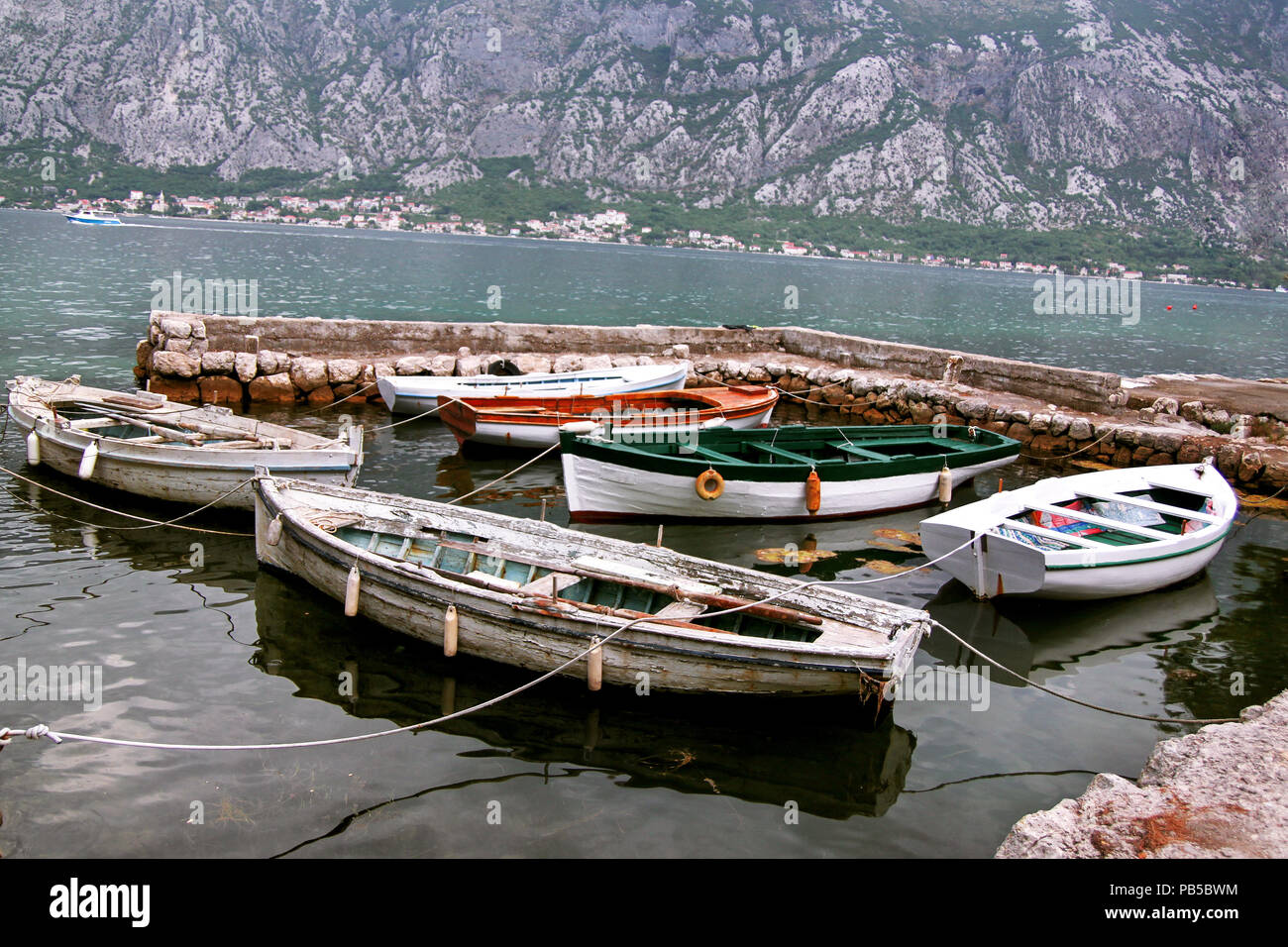 Small fishing boats anchored in the marina Stock Photo - Alamy