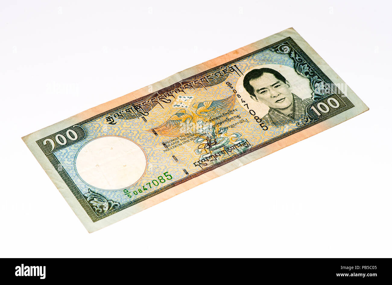 100 ngultrum bank note of Bhutan. Ngultrum is the national currency of ...