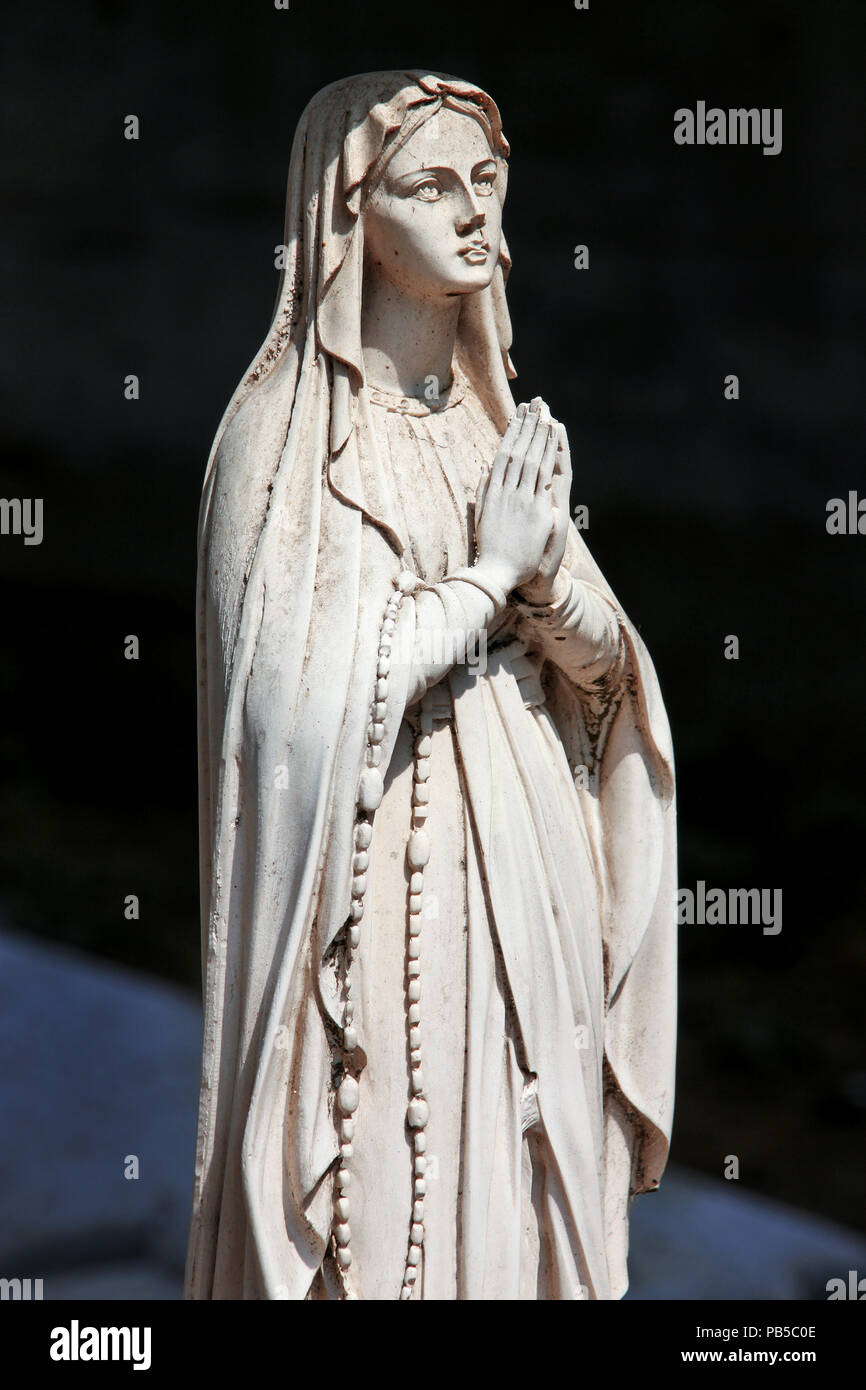 Funerary statue of the Virgin Mary, close up Stock Photo - Alamy
