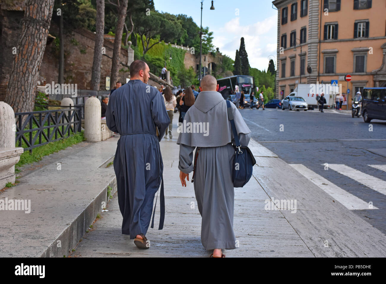 Rome, monks walk along a city street Stock Photo - Alamy