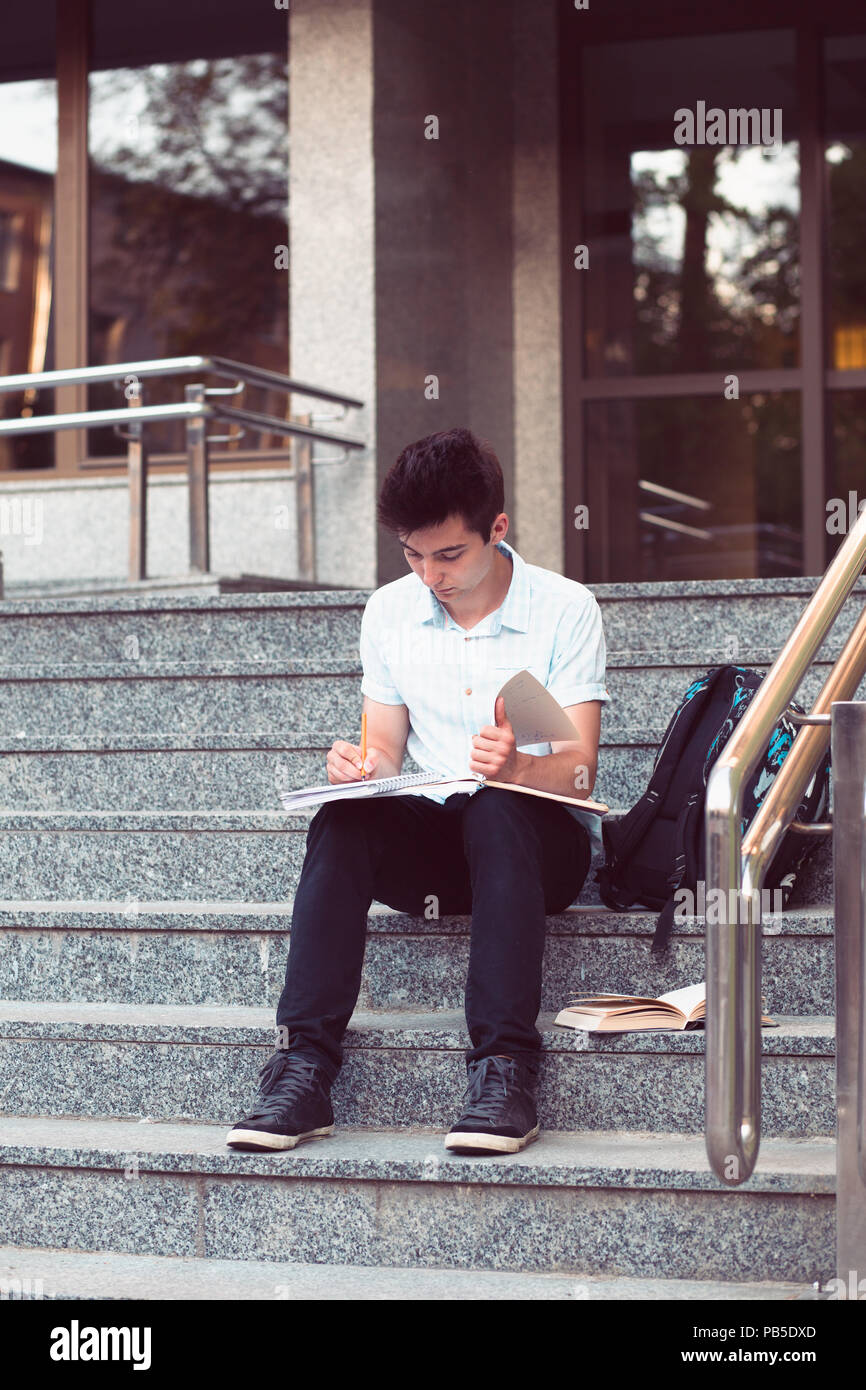 Student making notes outside hi-res stock photography and images - Alamy