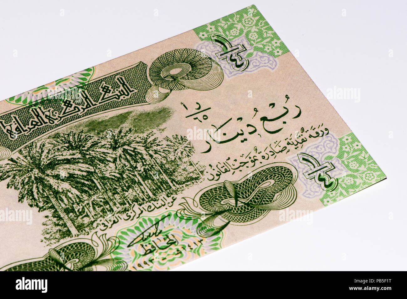 0.25 Iraqi dinar bank note. Iraqi dinar is the national currency of ...