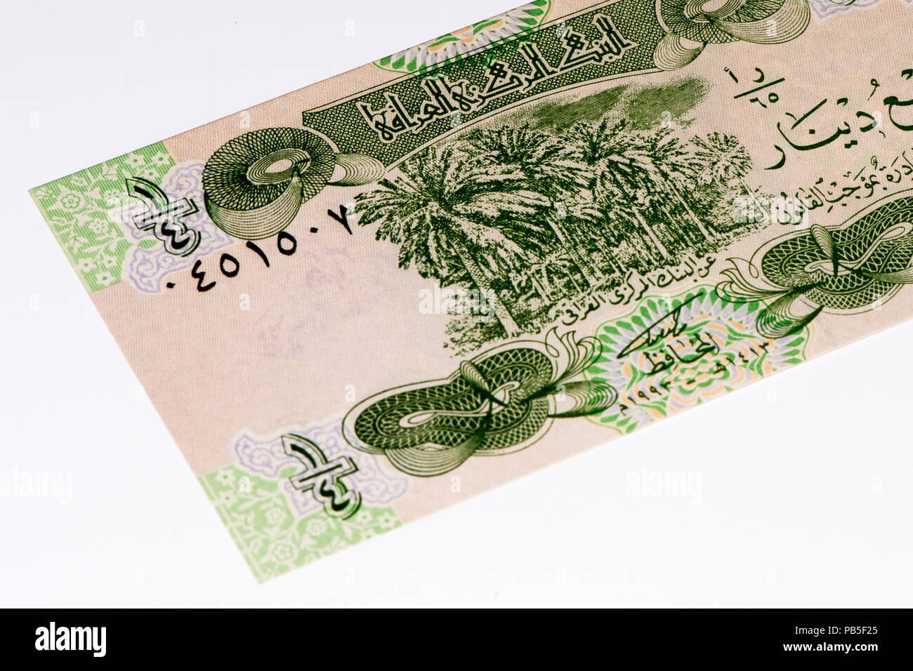 0.25 Iraqi dinar bank note. Iraqi dinar is the national currency of ...