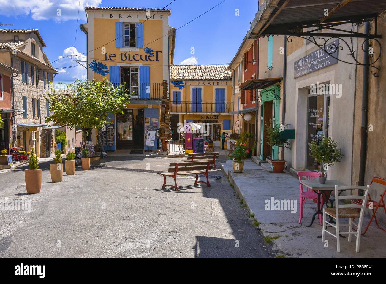 square and colourful houses of the village Banon, Provence, France ...