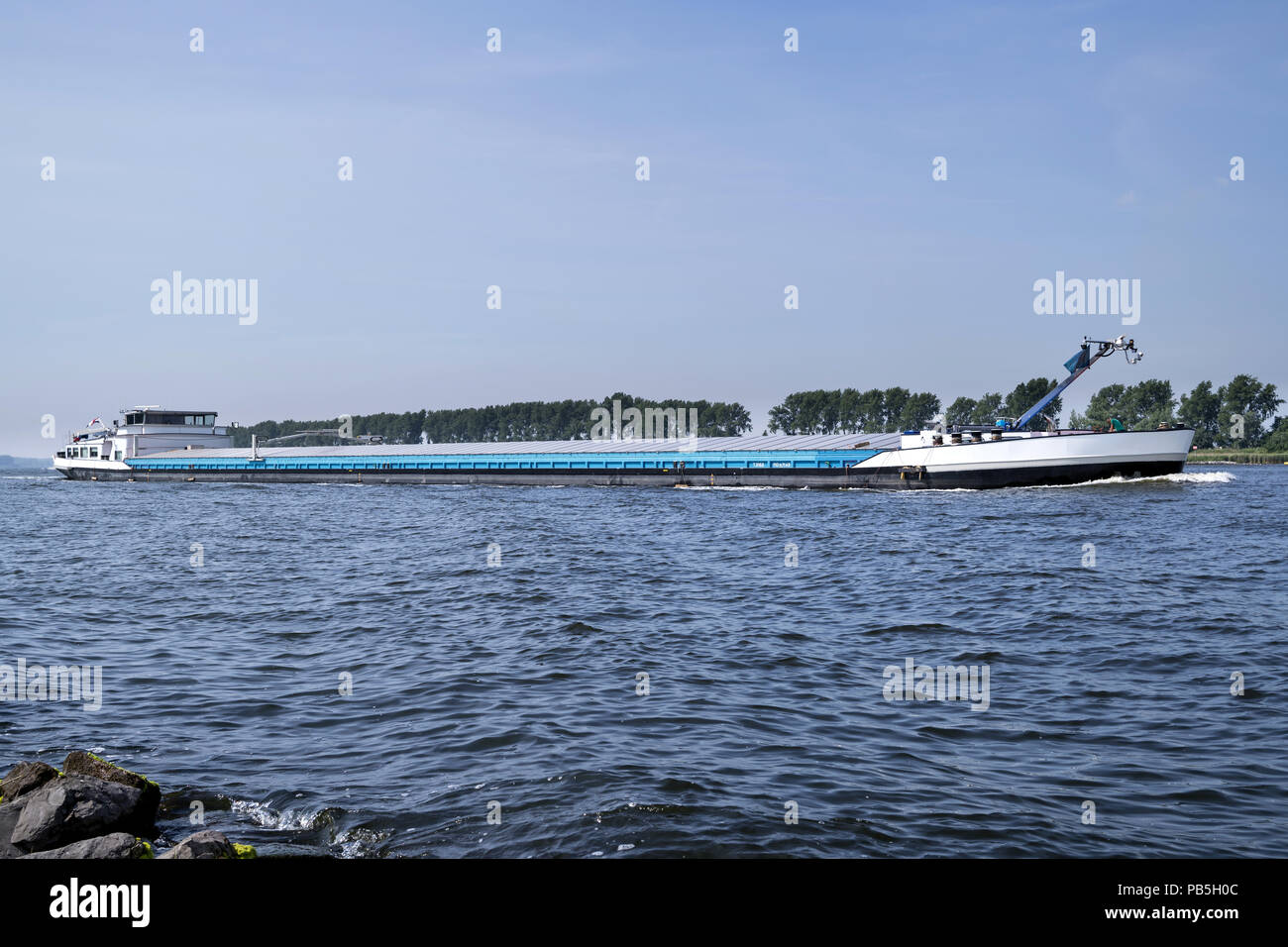 inland general cargo vessel shipping on canal Stock Photo - Alamy