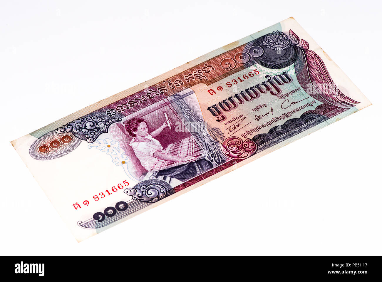 Cambodian money 100 riel currency hi-res stock photography and images ...