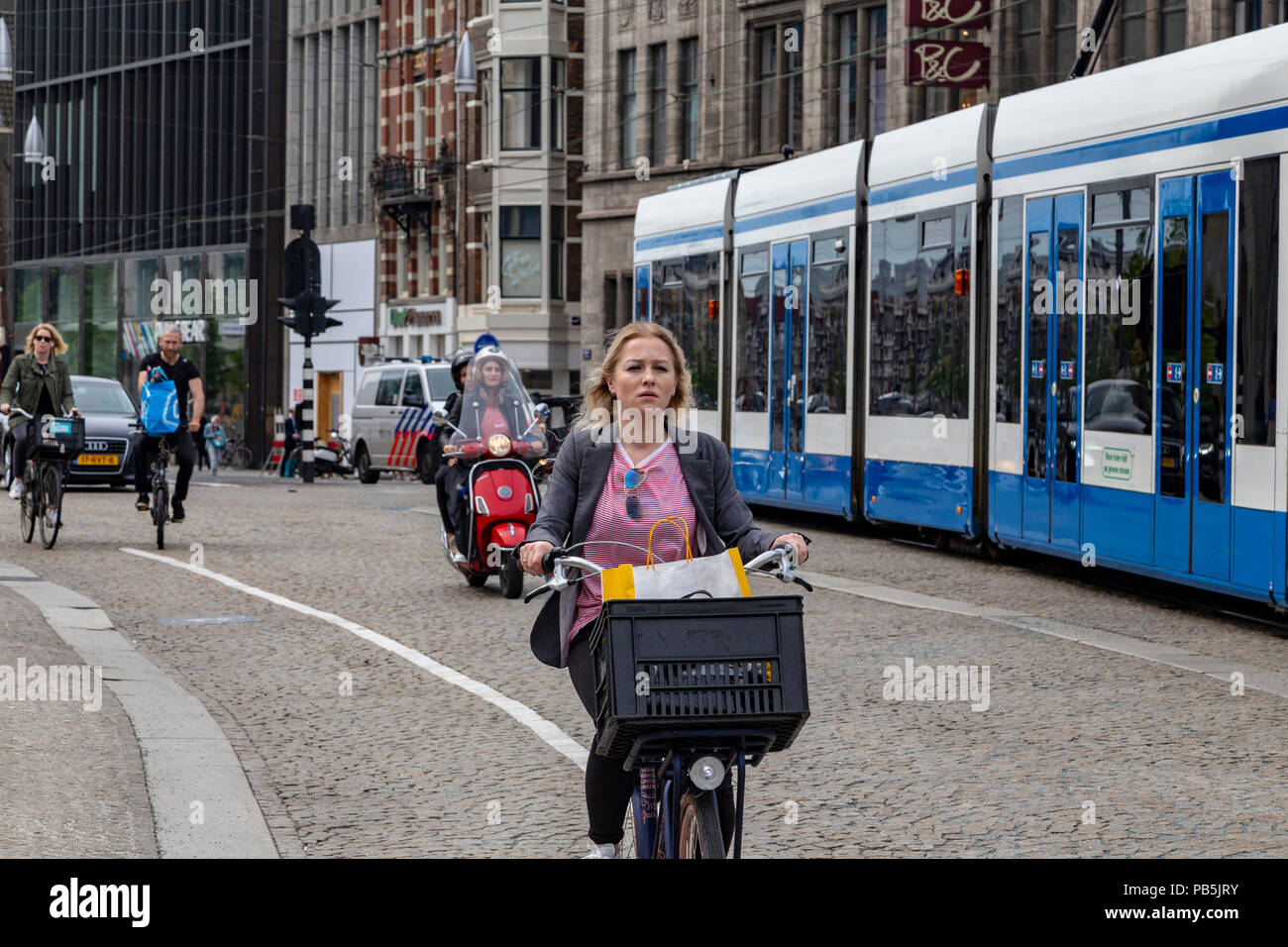 Amsterdam and bicycles and girl hi-res stock photography and images - Alamy