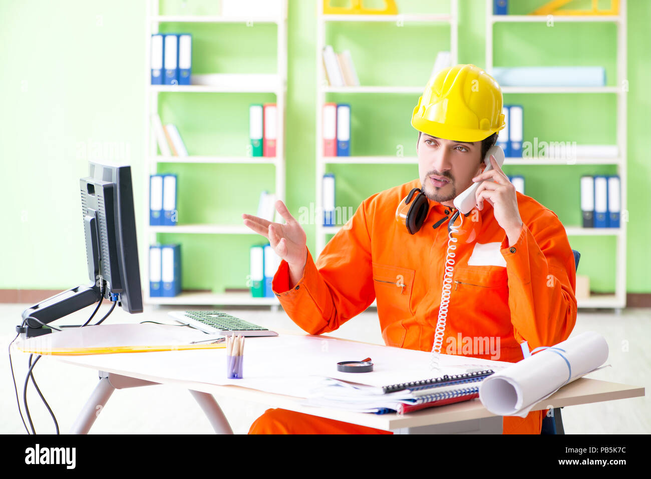 Construction supervisor planning new project in office Stock Photo - Alamy