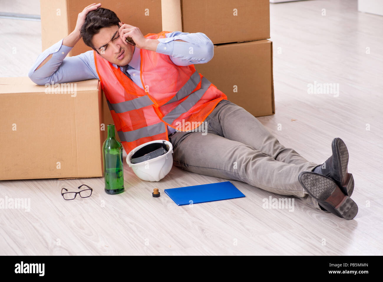 Delivery man drunk at work Stock Photo - Alamy