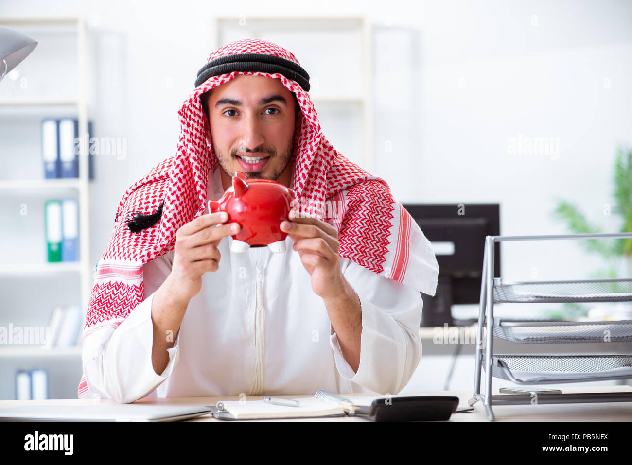 Arab businessman working in the office Stock Photo - Alamy