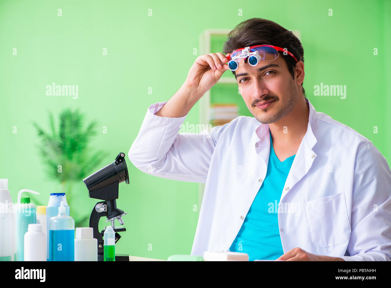 Chemist testing soap in the lab Stock Photo - Alamy