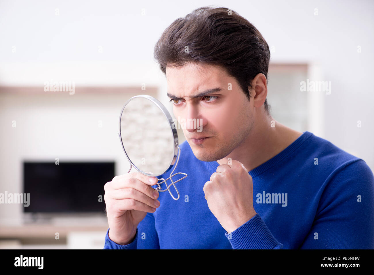 Man panicking because of pimples on the skin Stock Photo - Alamy