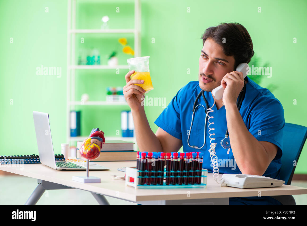 Doctor doing blood analysis in the lab Stock Photo - Alamy