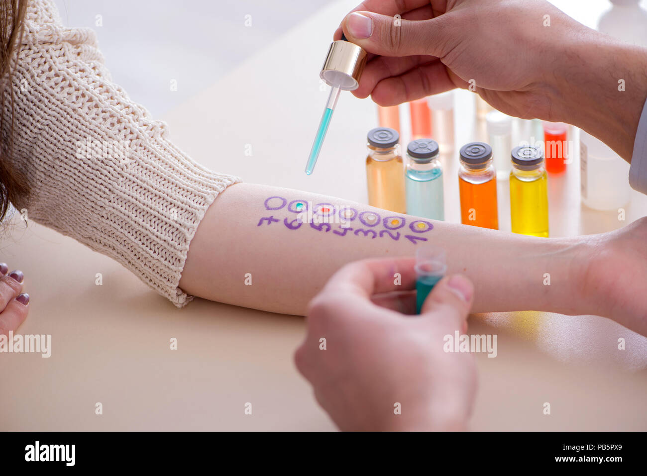 Doctor testing allergy reaction of patient in hospital Stock Photo - Alamy