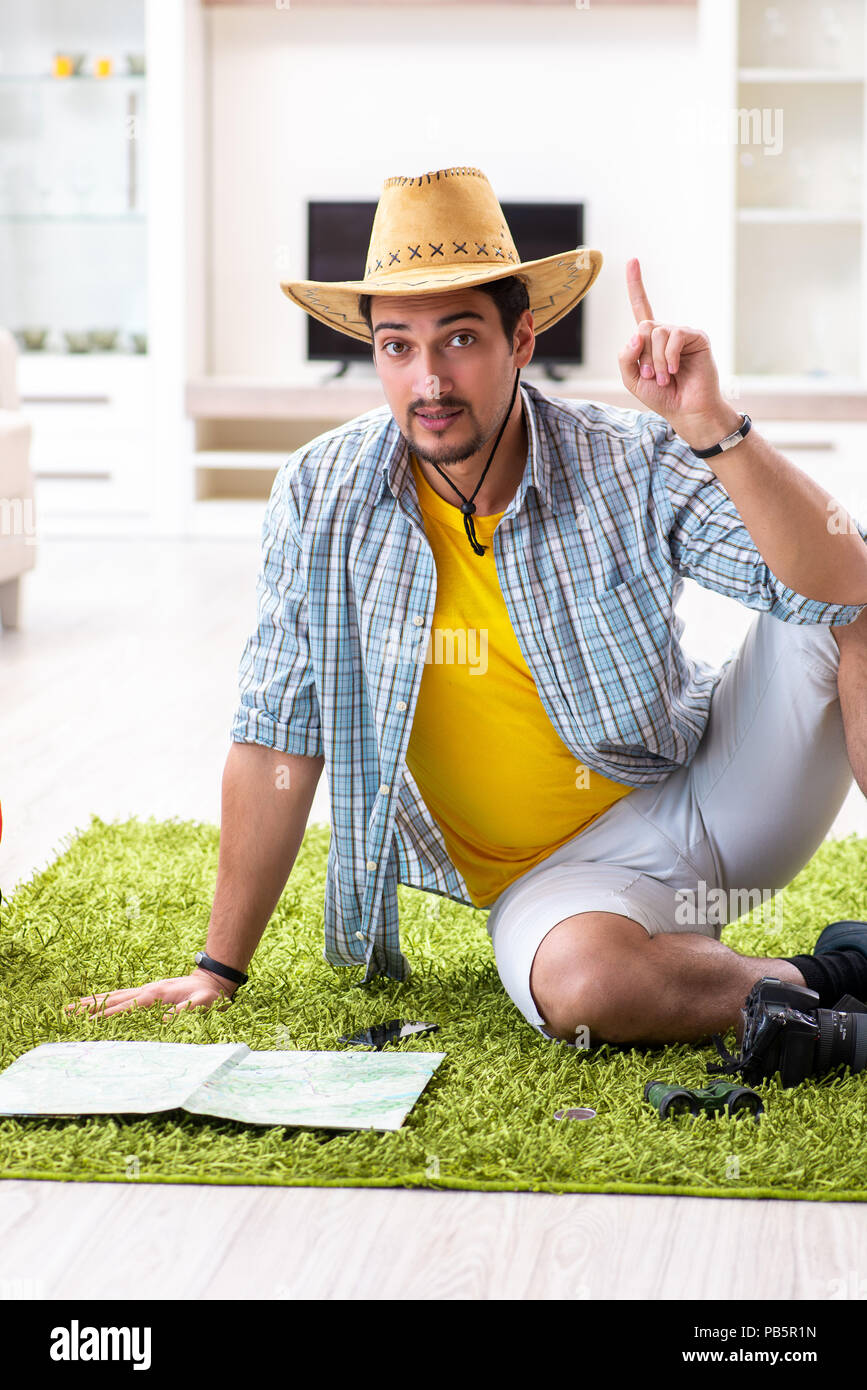 Man planning his travel with map Stock Photo - Alamy