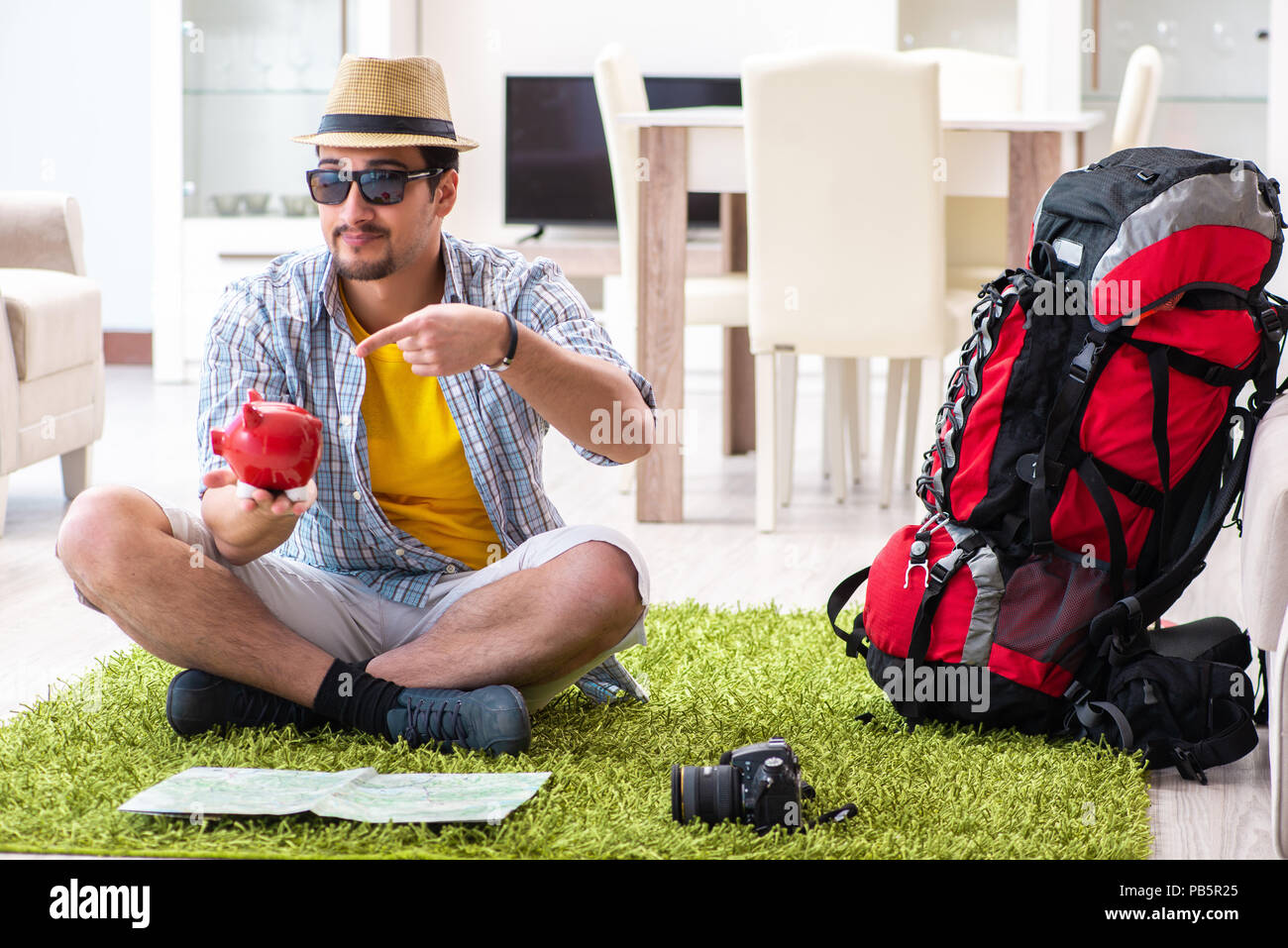 Man planning his travel with map Stock Photo - Alamy