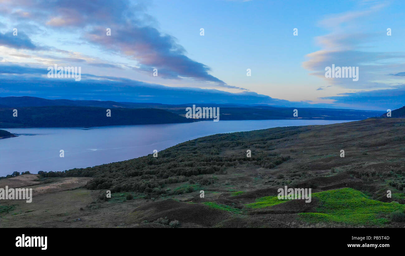 Beautiful Loch Shin in Scotland - aerial view in the evening Stock ...