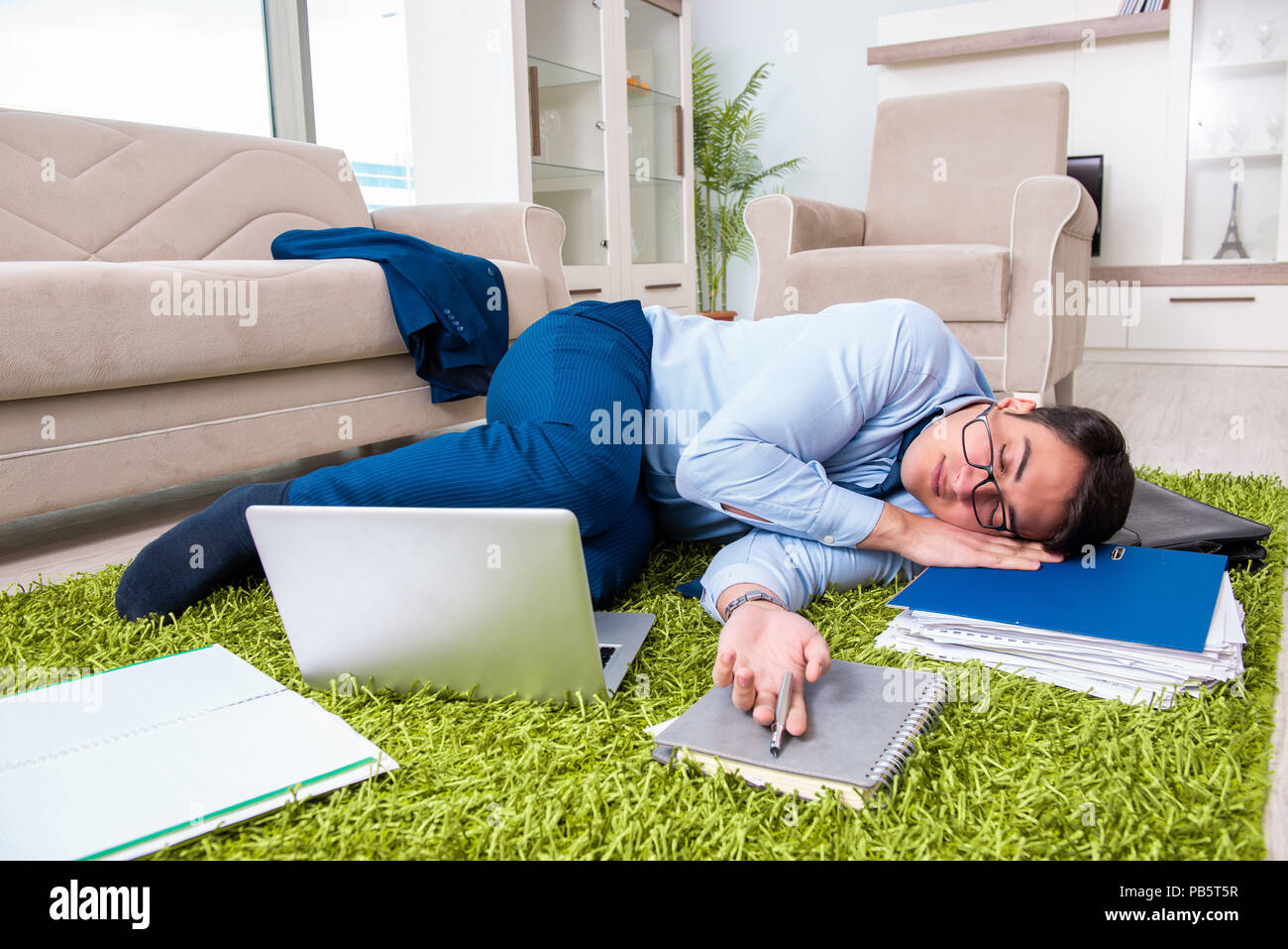 Tired and exhausted businessman relaxing after hard day Stock Photo - Alamy
