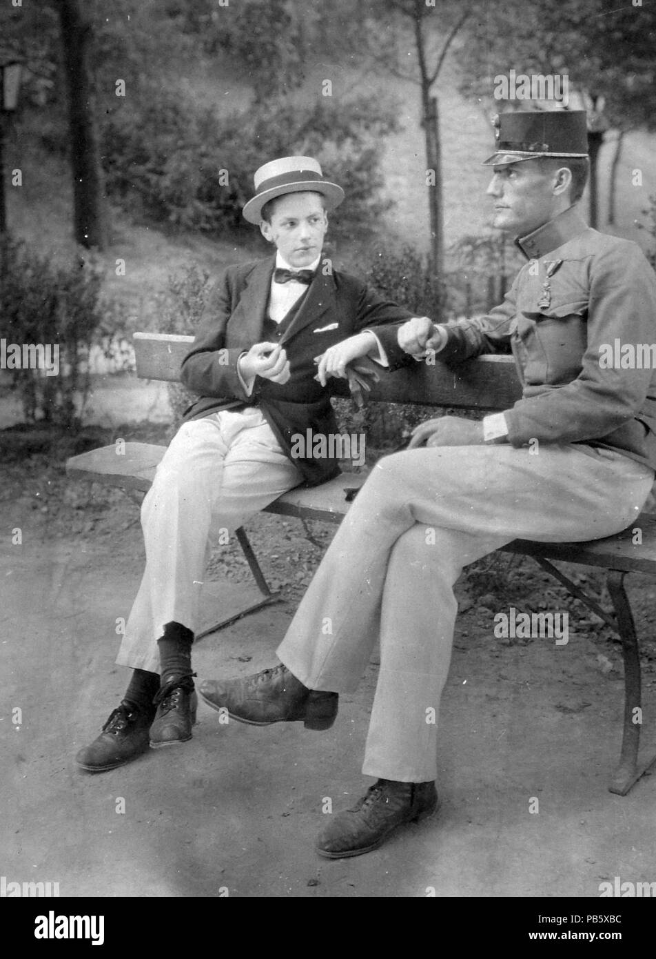 1252 Relaxation, men, uniform, bench Fortepan 10687 Stock Photo - Alamy