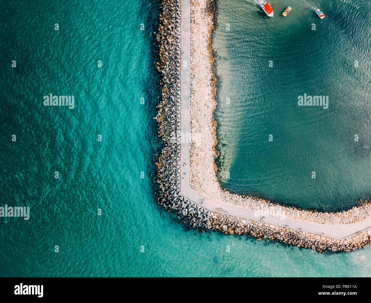 Aerial Drone View Of Concrete Pier On Turquoise Water At The Black Sea ...