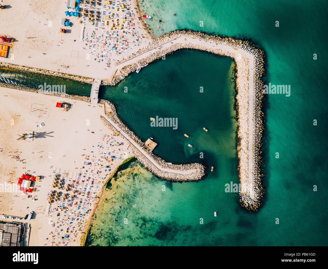 Aerial Drone View Of Concrete Pier On Turquoise Water At The Black Sea ...