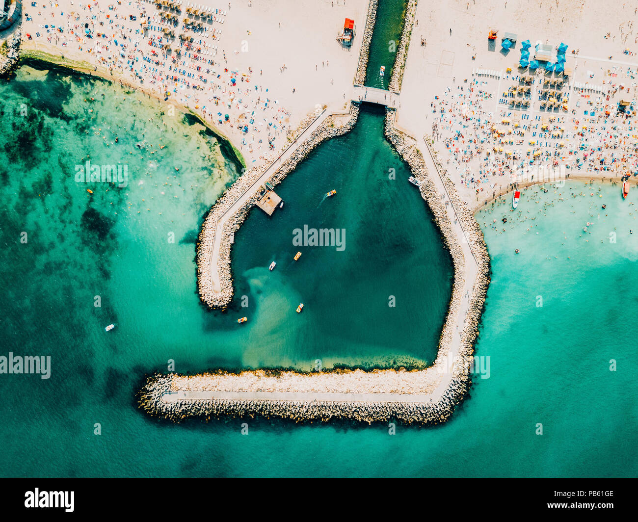 Aerial Drone View Of Concrete Pier On Turquoise Water At The Black Sea ...