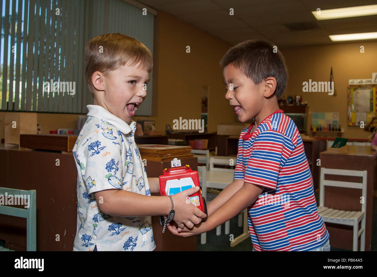 Boys learn that sharing can make everyone happy MR © Myrleen Pearson ...