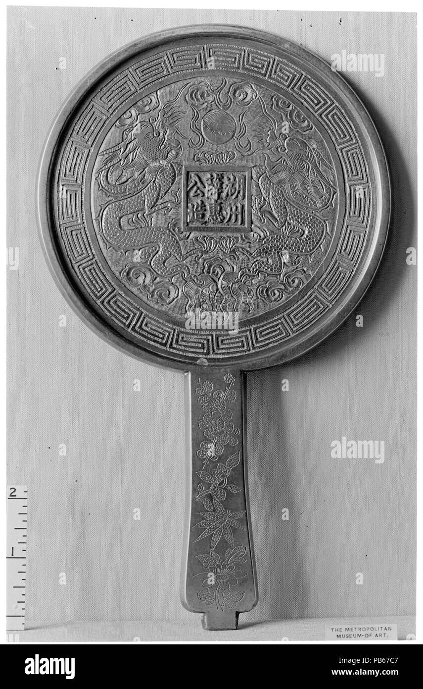 Mirror. Culture: China. Dimensions: H. 10 1/2 in. (26.7 cm); W. 6 1/4 ...