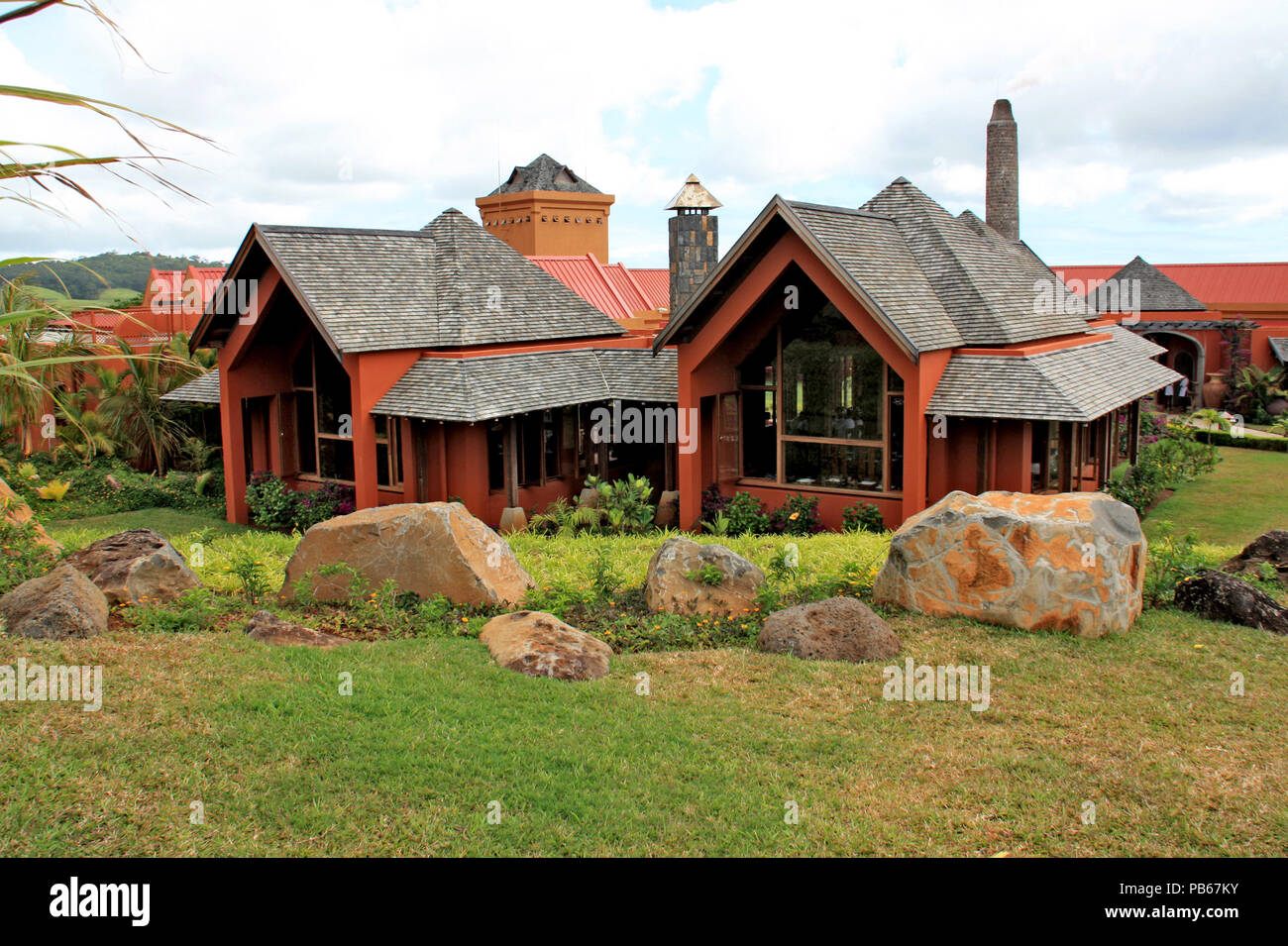 Exterior view of the well known rum distillery building near Chamarel ...