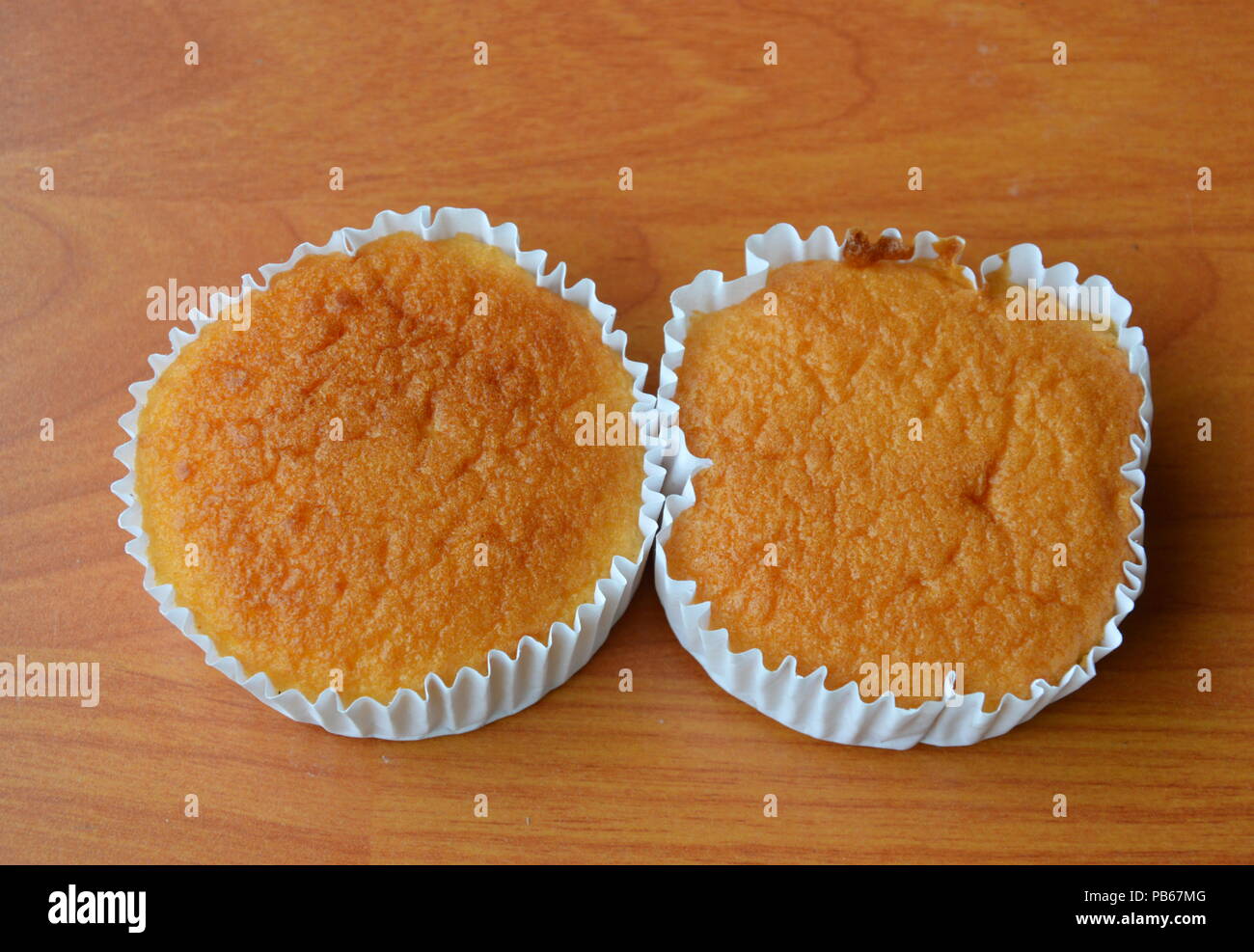 butter cupcake on paper tray Stock Photo - Alamy