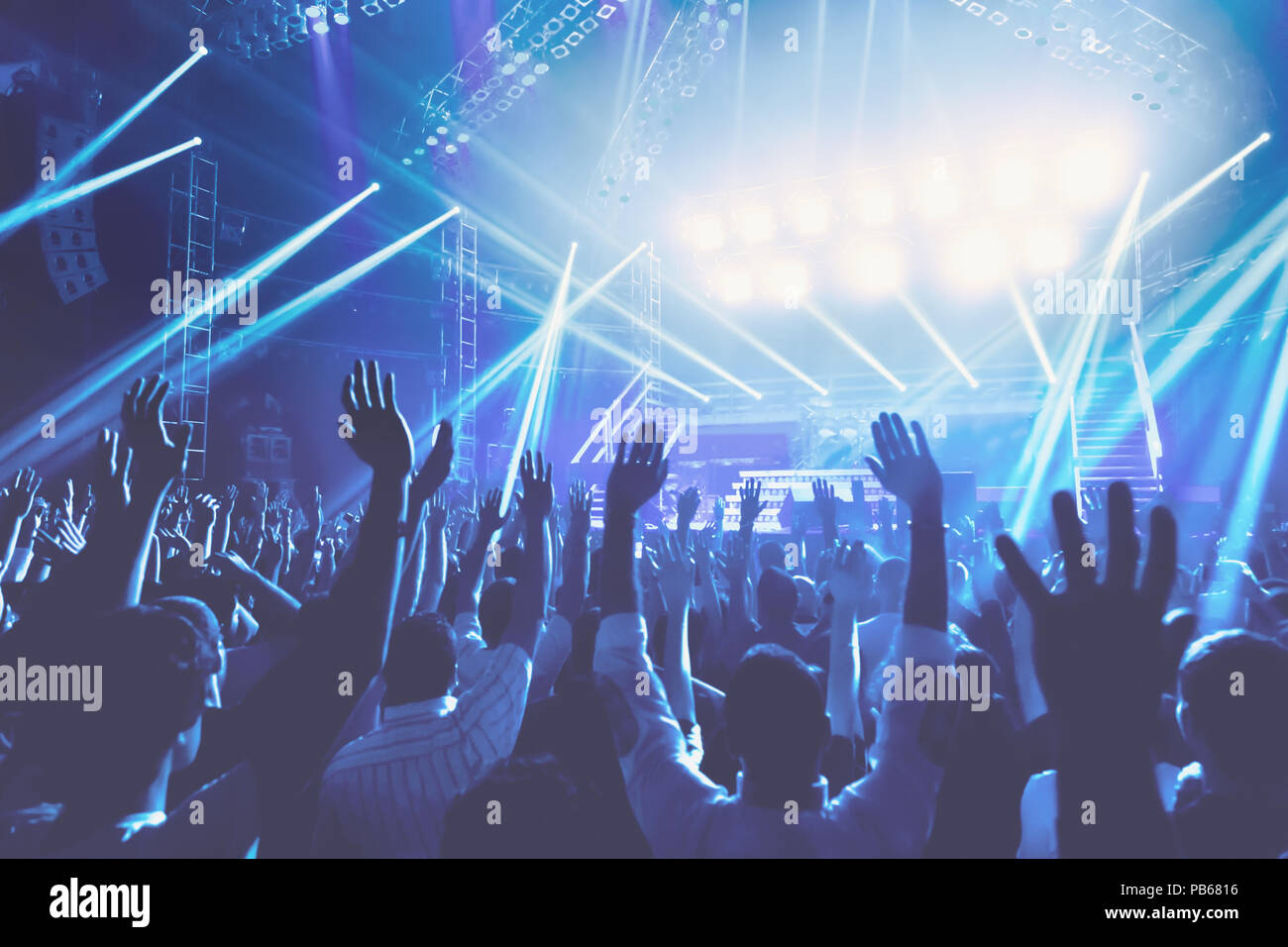 Young people with pleasure spending evening on the concert, crowd with ...