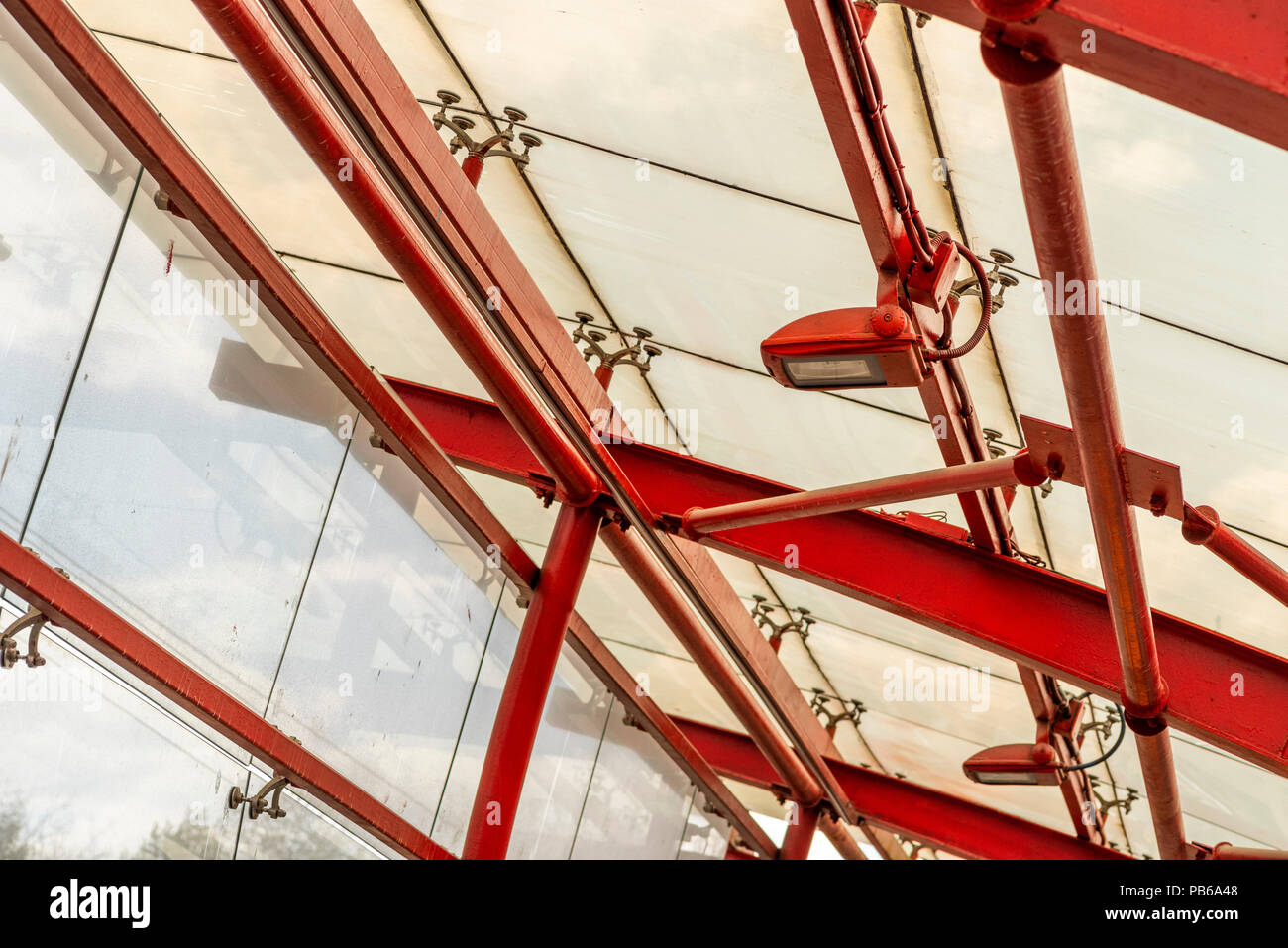 glass canopy with metal structures on the sky background Stock Photo ...
