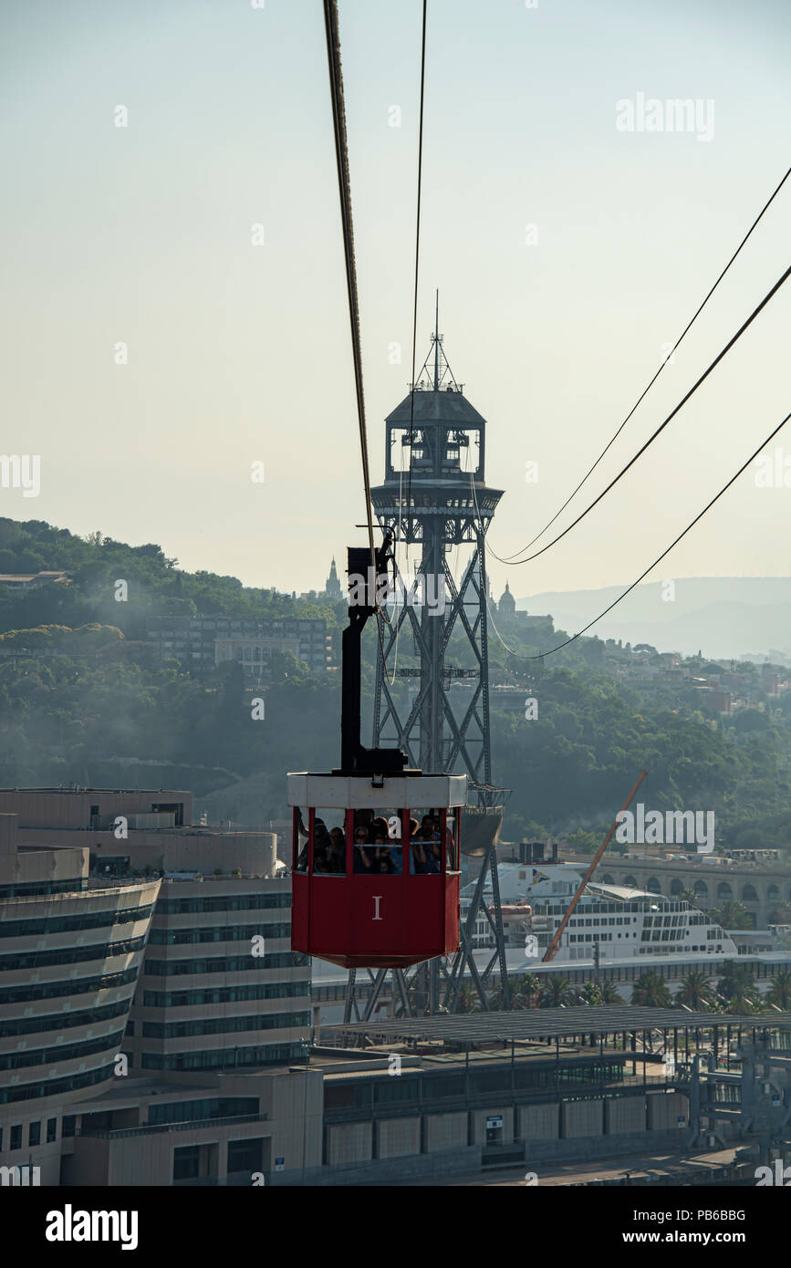 ES, Barcelona Port Cable Car - June 2018: Loaded cable car coming in to ...