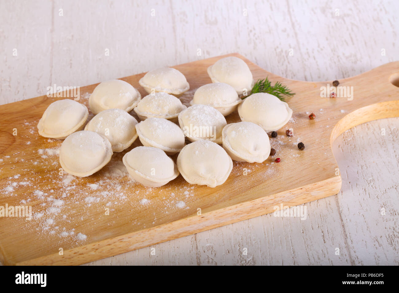 Raw dumplings for cooking Stock Photo - Alamy
