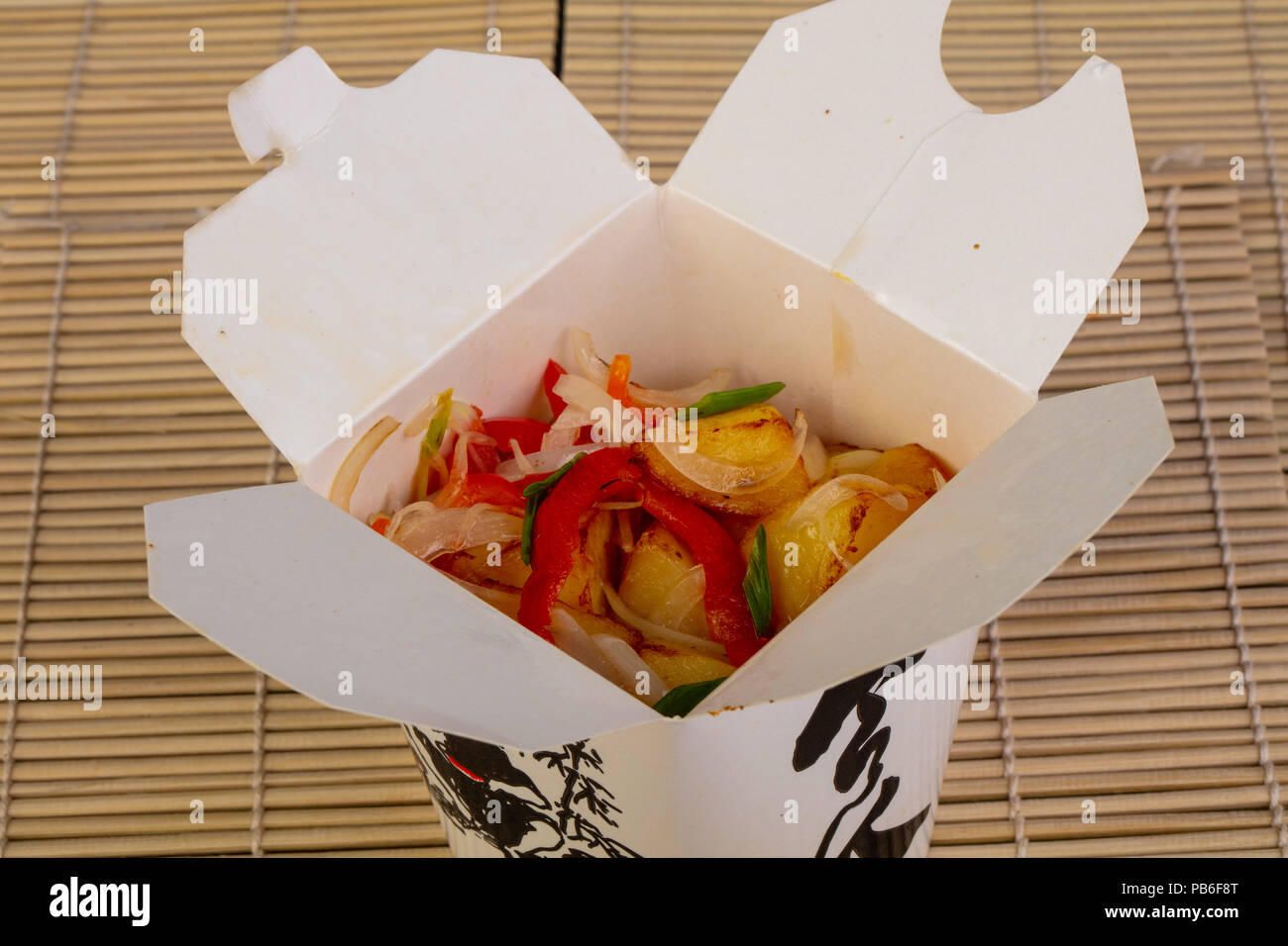 Delicious box of fried potatoes Stock Photo - Alamy