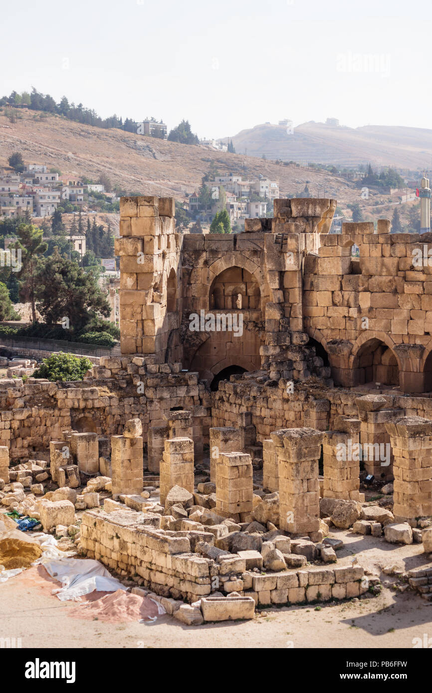 Roman ruins with Anti-Lebanon mountain range in the background at a ...