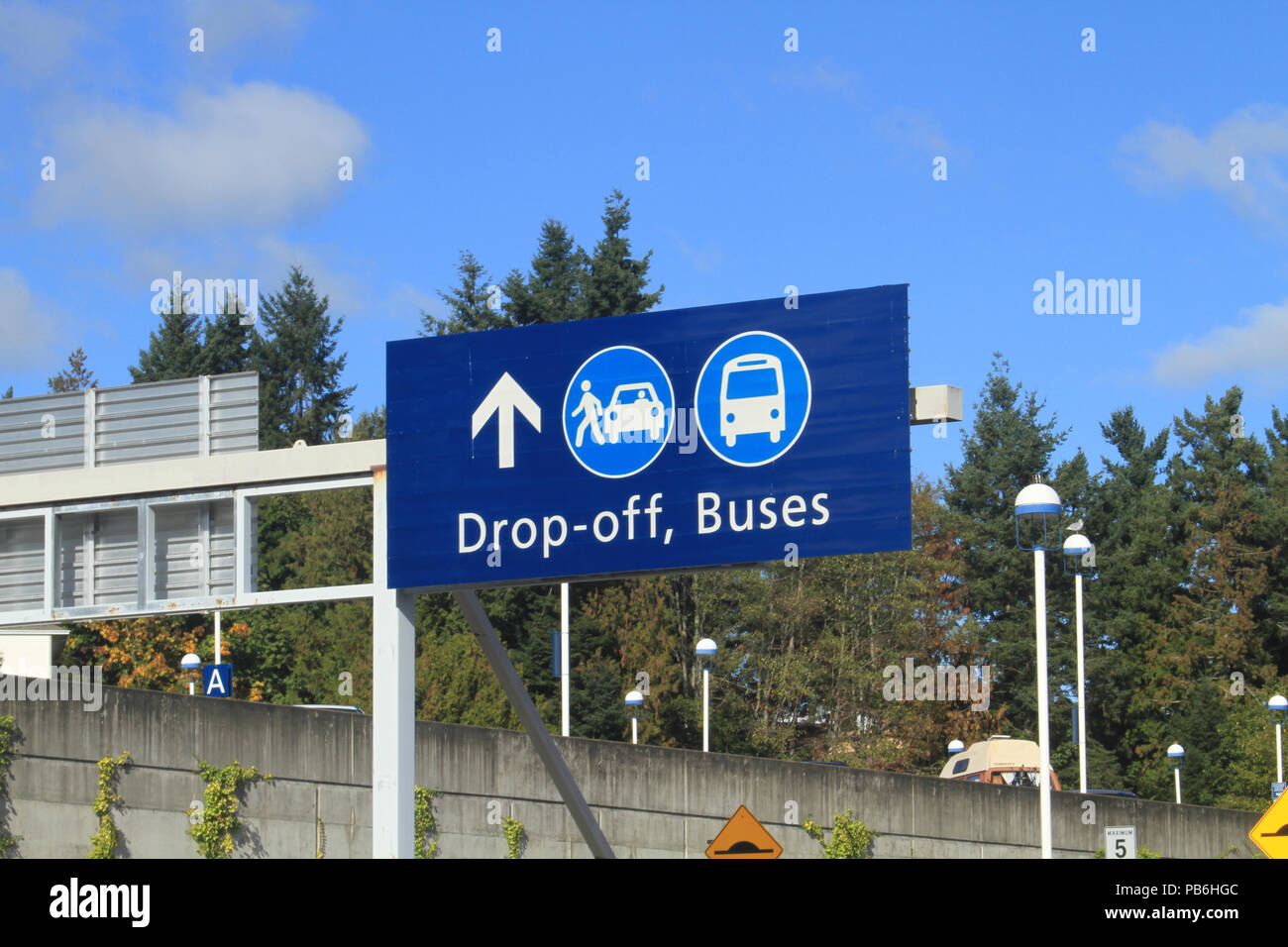 Directions to Drop off, Buses sign Stock Photo - Alamy