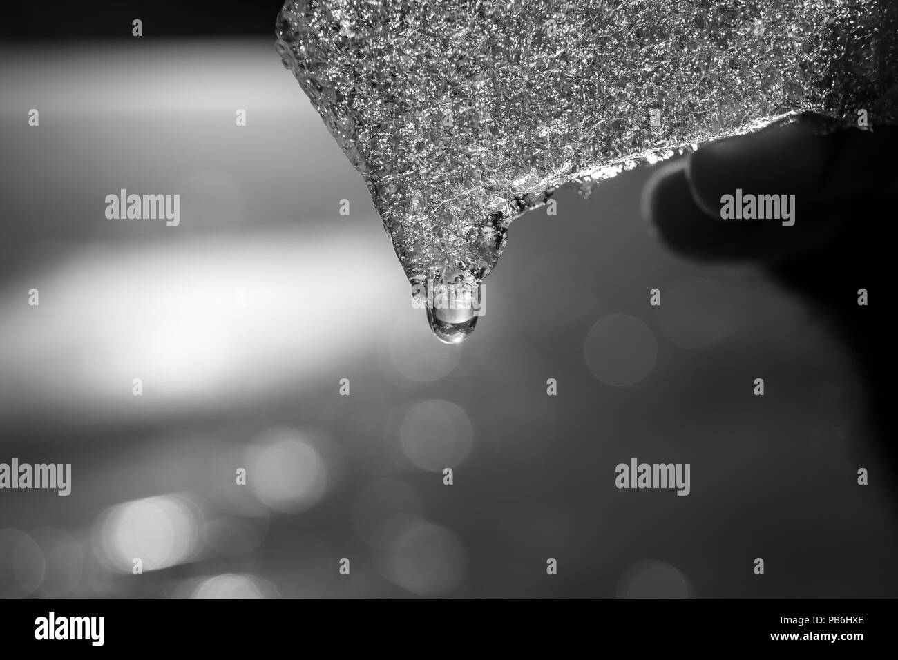 Piece ice on blue Black and White Stock Photos & Images - Alamy